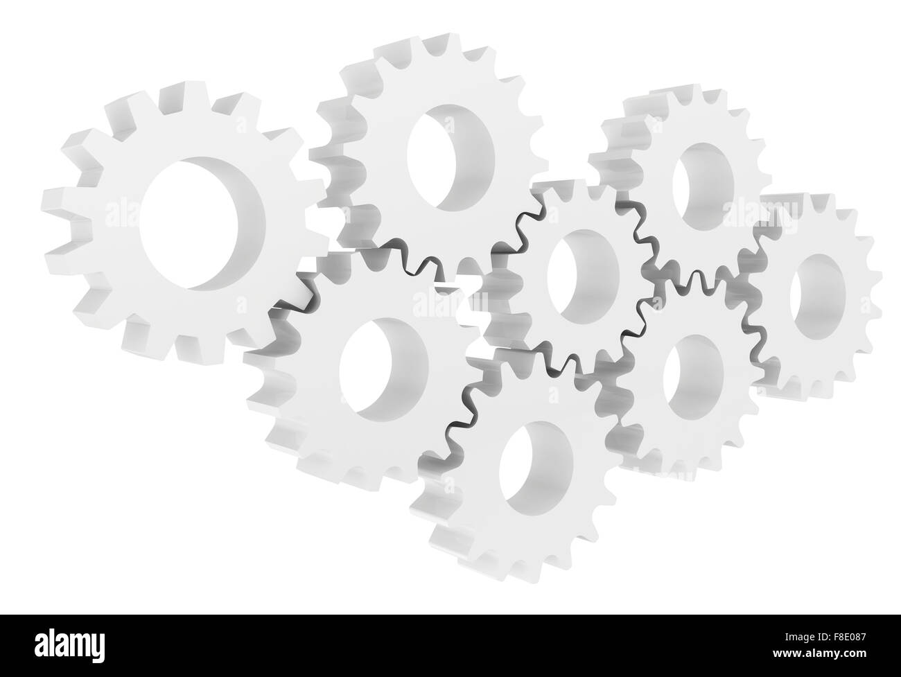 Cog wheel gear mechanism close-up. White background Stock Photo - Alamy