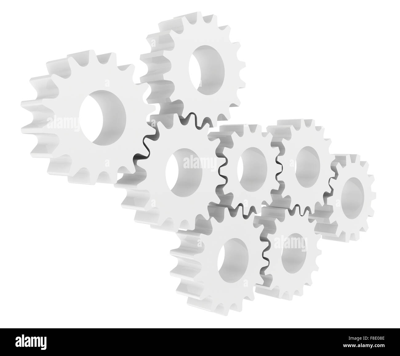 Cog wheel gear mechanism close-up. White background Stock Photo - Alamy