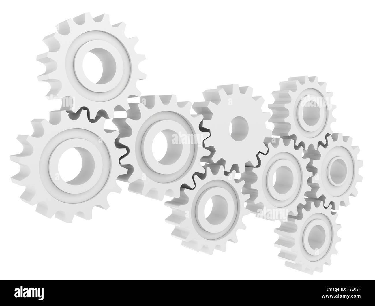 Cog wheel gear mechanism close-up. White background Stock Photo - Alamy