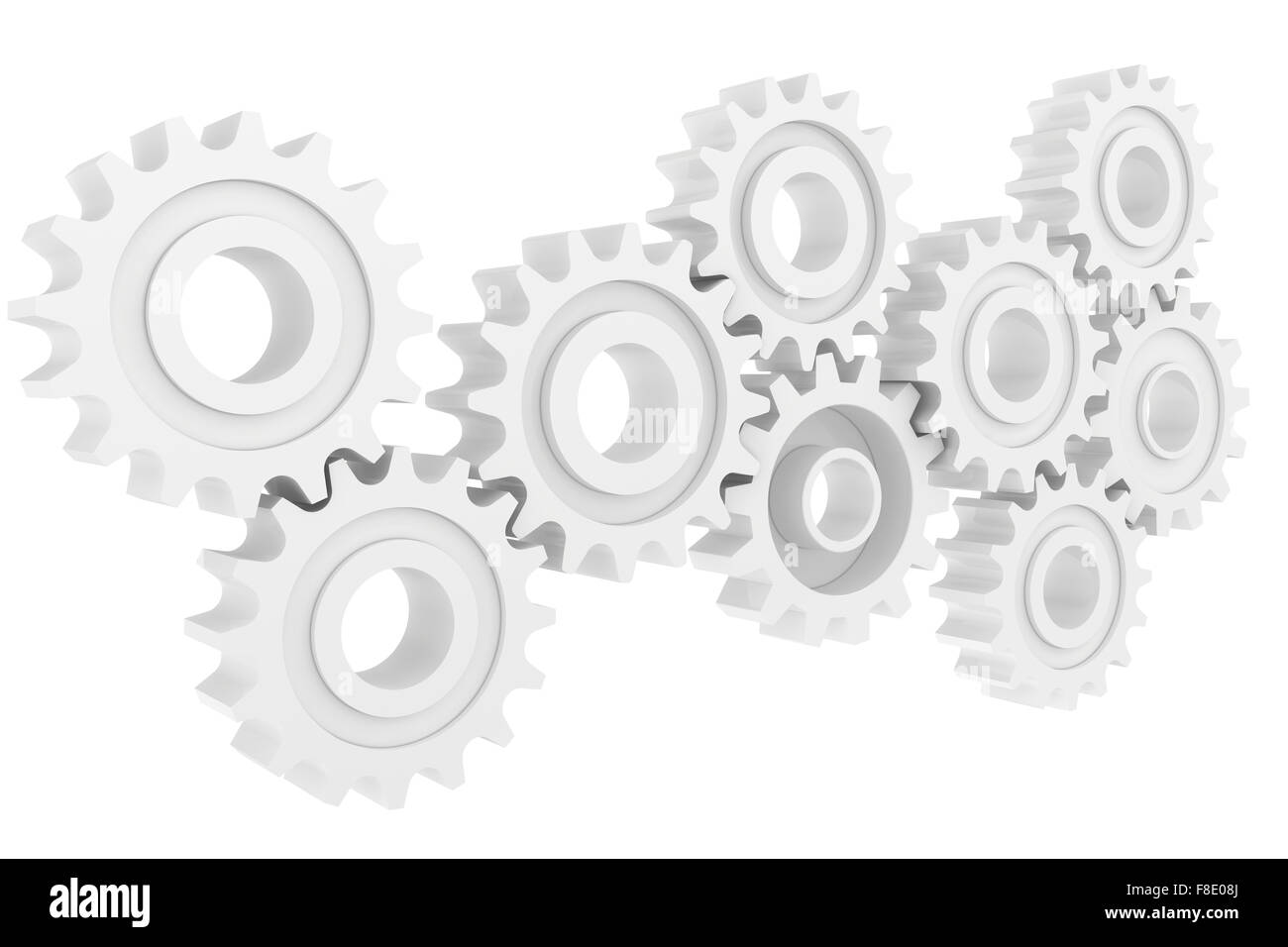 Cog wheel gear mechanism close-up. White background Stock Photo - Alamy