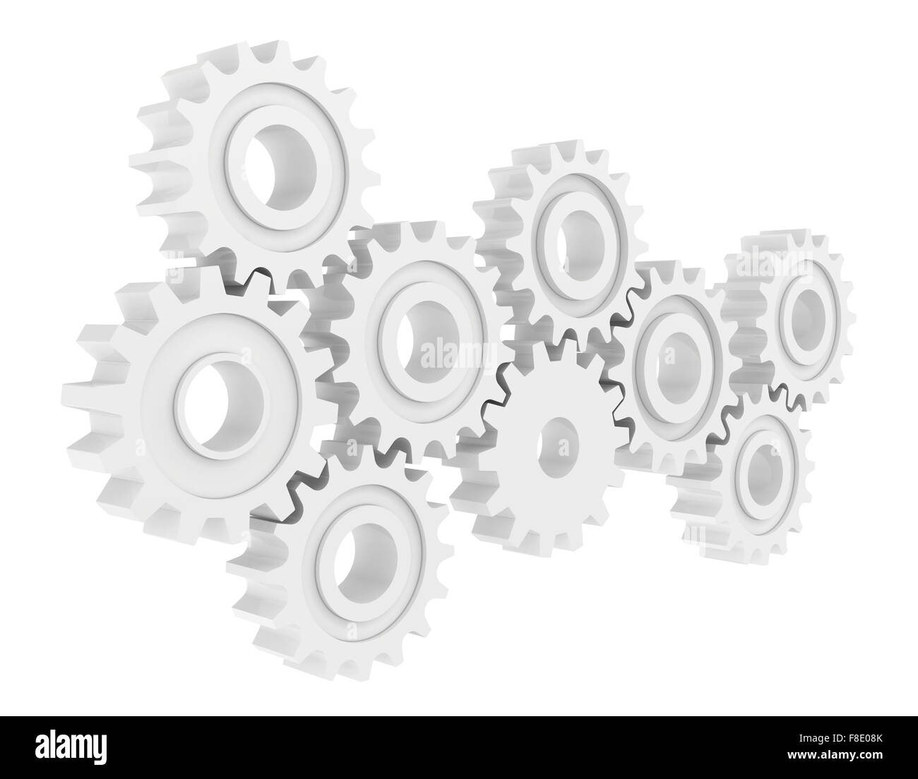Cog wheel gear mechanism close-up. White background Stock Photo - Alamy