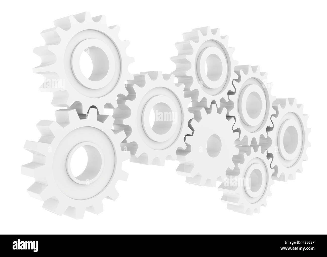 Cog wheel gear mechanism close-up. White background Stock Photo - Alamy