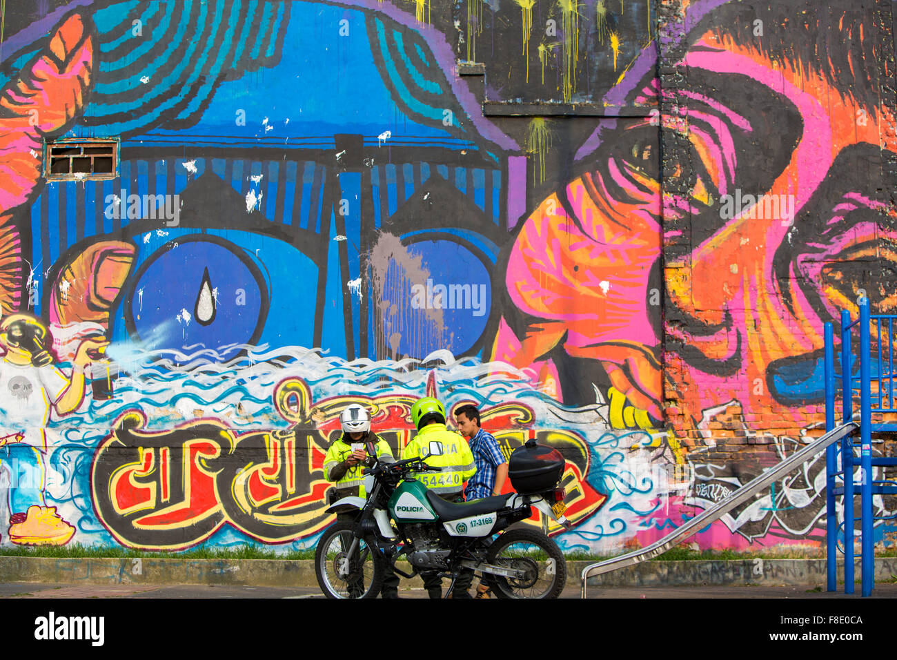 Police control and graffiti, street art in Bogota, Colombia Stock Photo ...