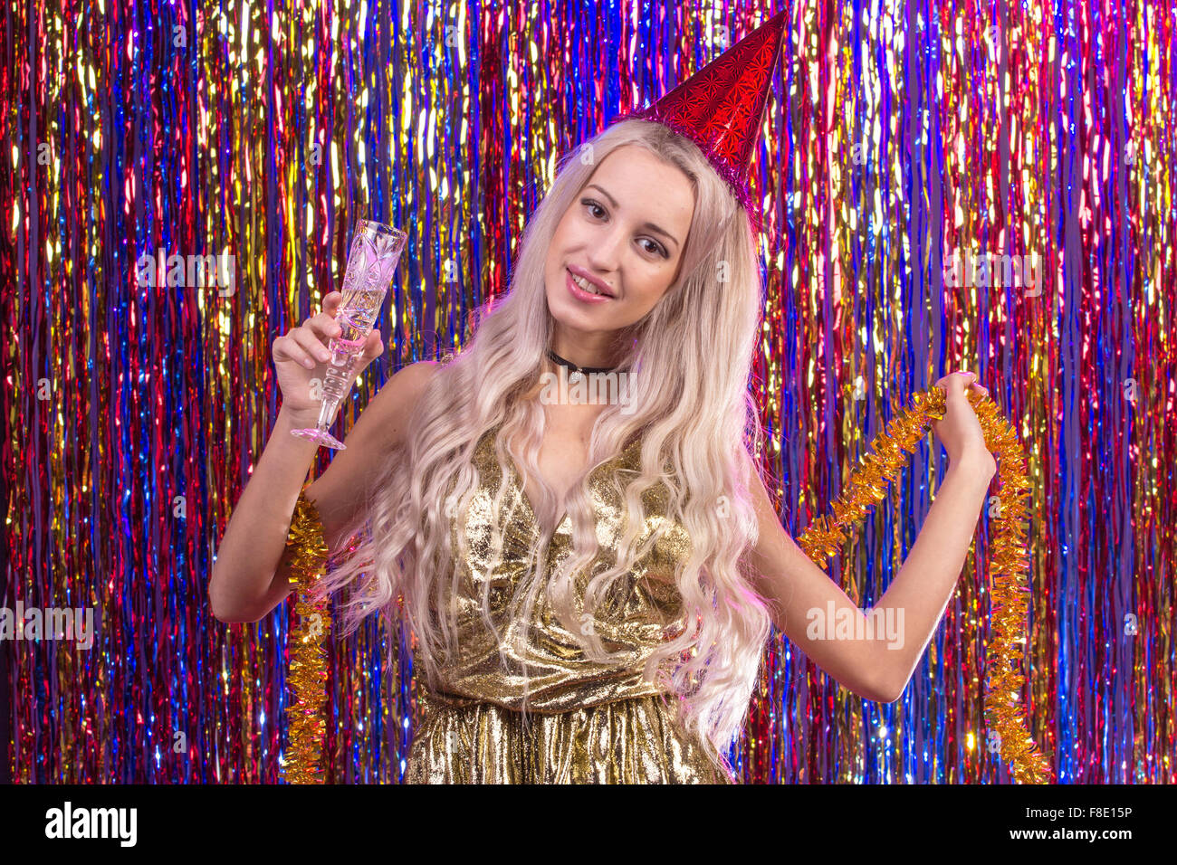 Pretty girl having fun on a dance party with glass of wine Stock Photo ...