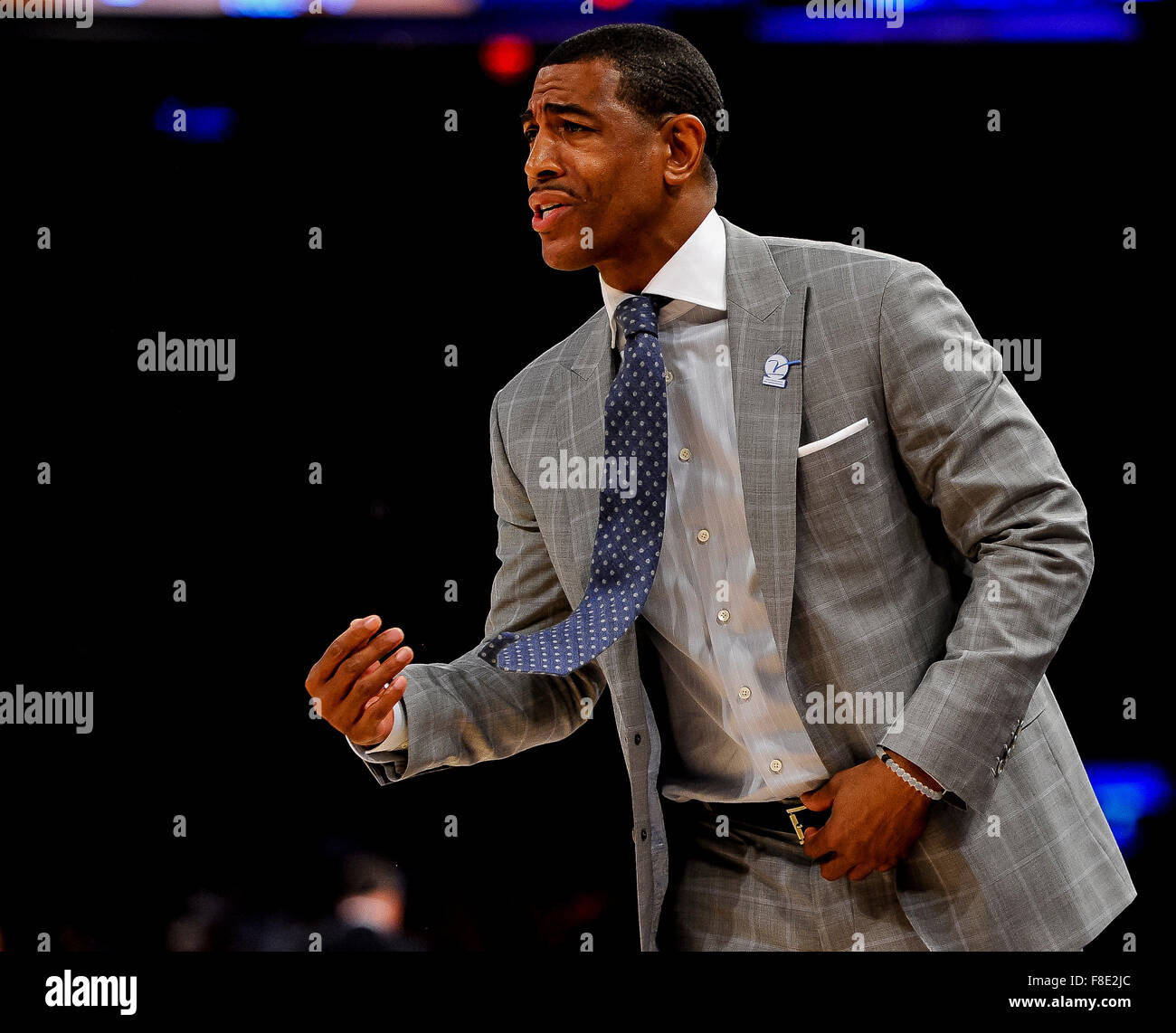 New York, USA. 8th Dec, 2015. Connecticut coach Kevin Ollie watches the ...
