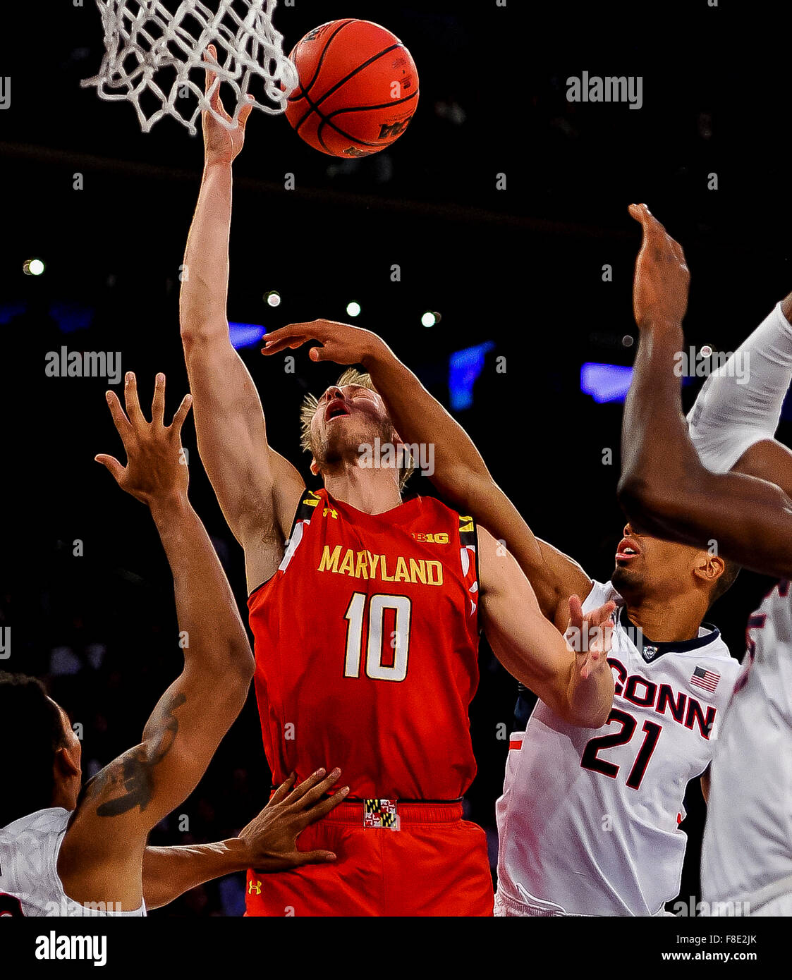 New York, USA. 8th Dec, 2015. Maryland's Jake Layman is fouled by ...