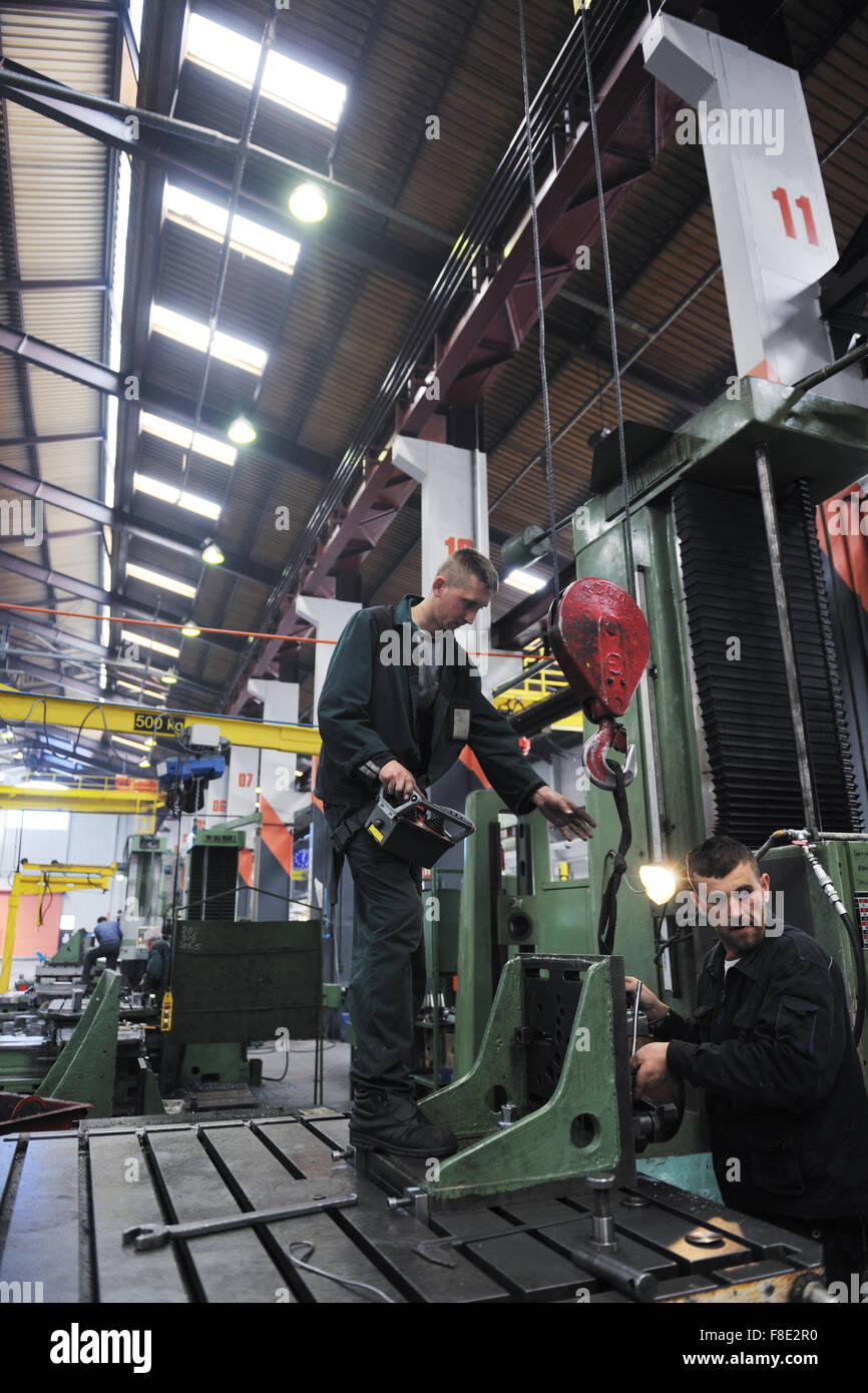 engineering people manofacturing industry with big modern computer ...