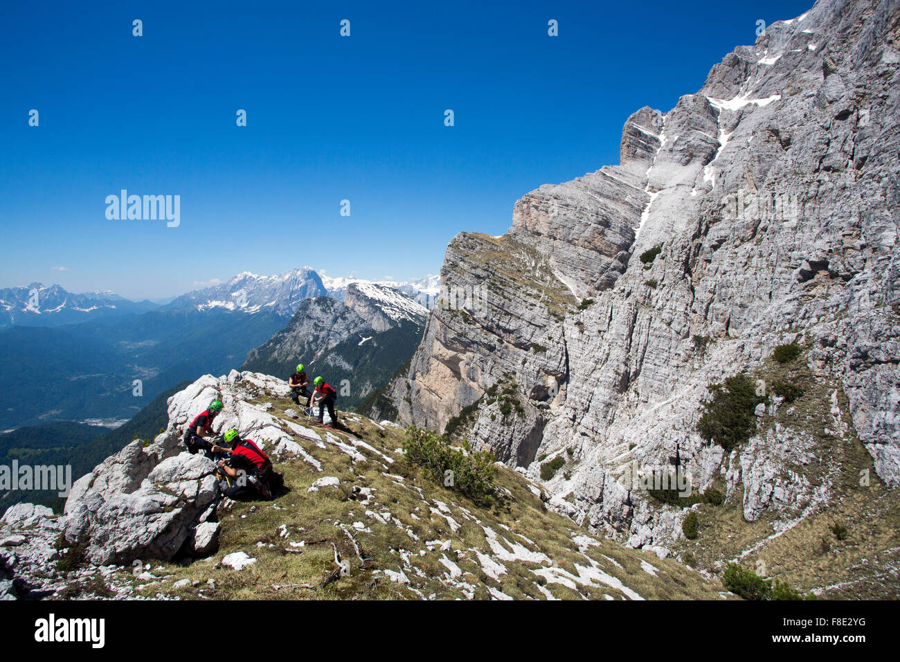 Mountain rescue team members in action in the mountains of Dolomites ...