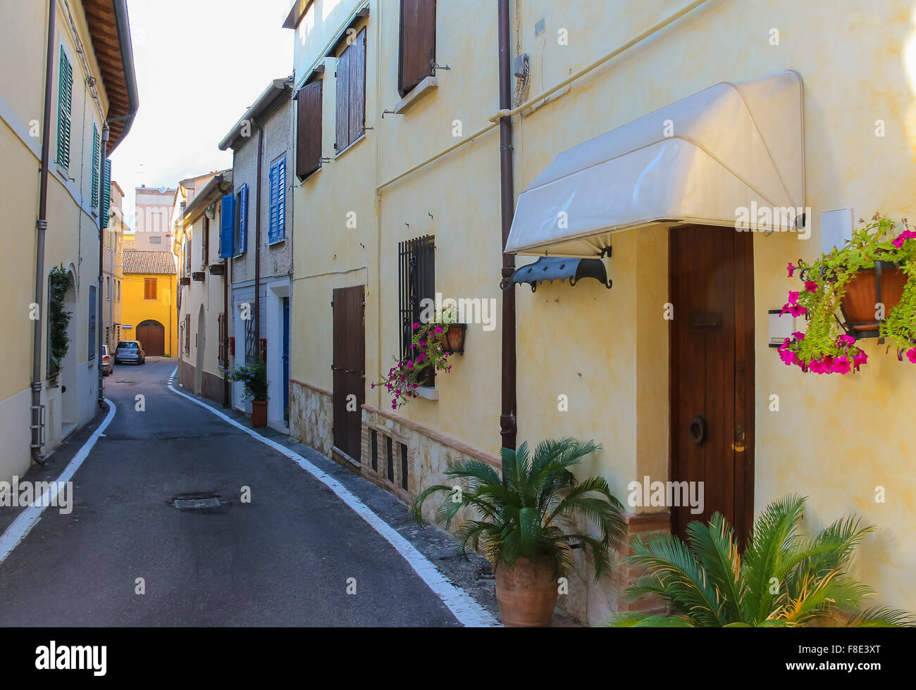 Traditional narrow street in the center of Rimini, Italy Stock Photo ...