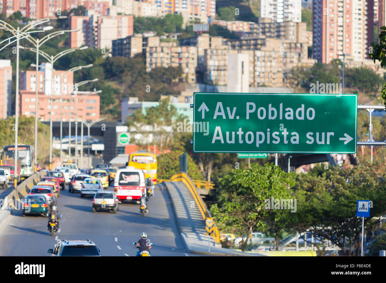 Cityscape and traffic sign road to Poblado, Medellin Stock Photo - Alamy
