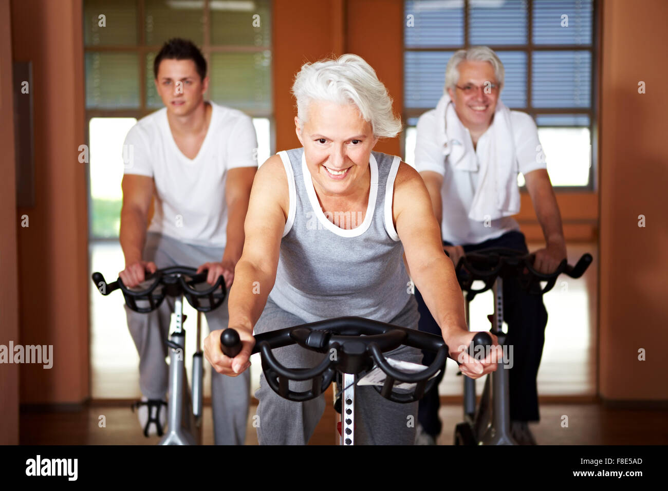 Spinning class with senior people in a gym Stock Photo - Alamy