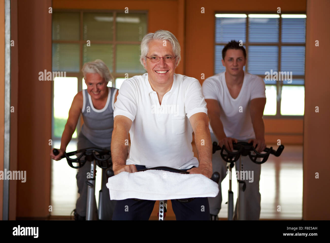 Spinning class with senior people in a gym Stock Photo - Alamy