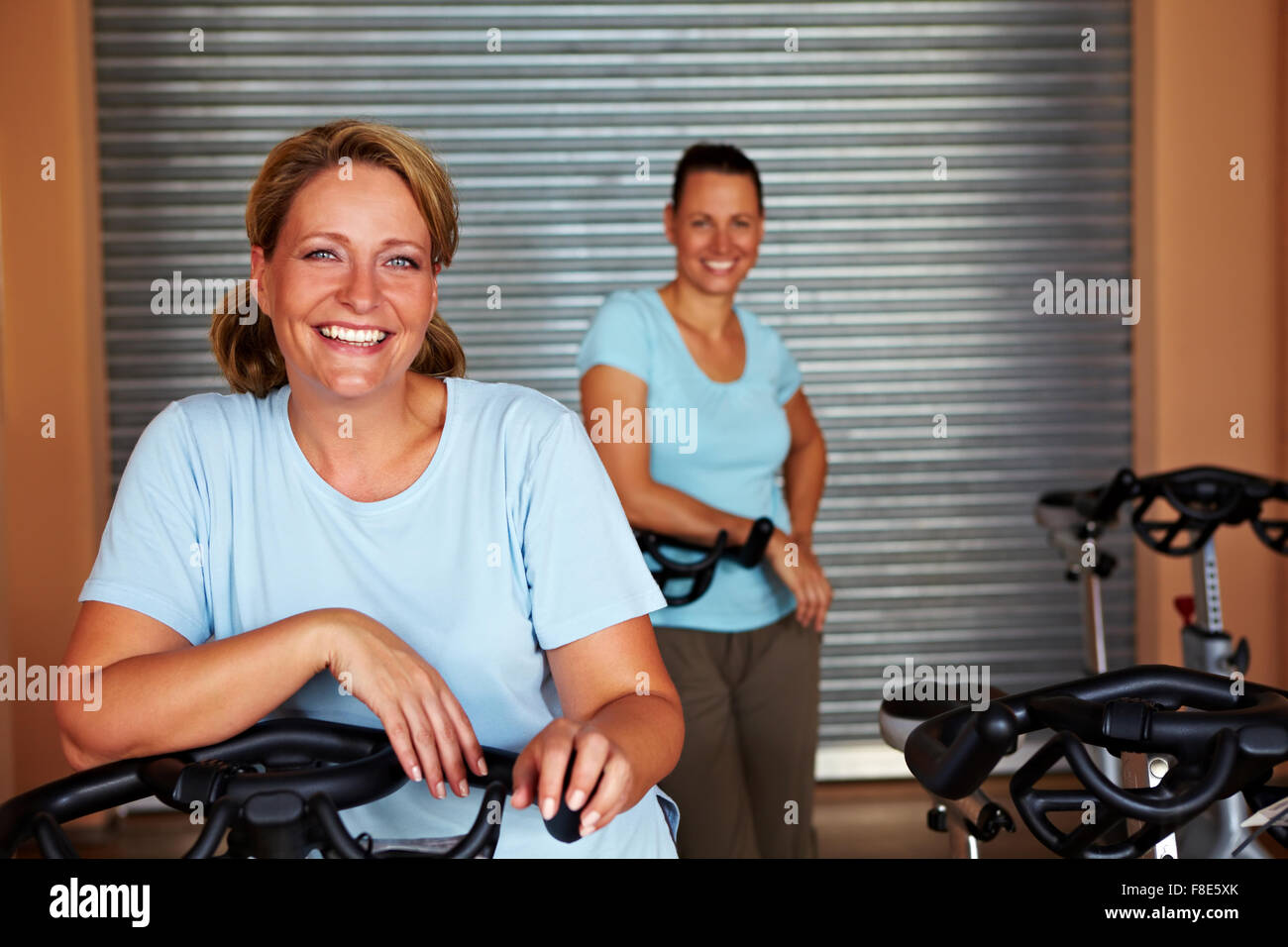 Two women spinning hi-res stock photography and images - Alamy