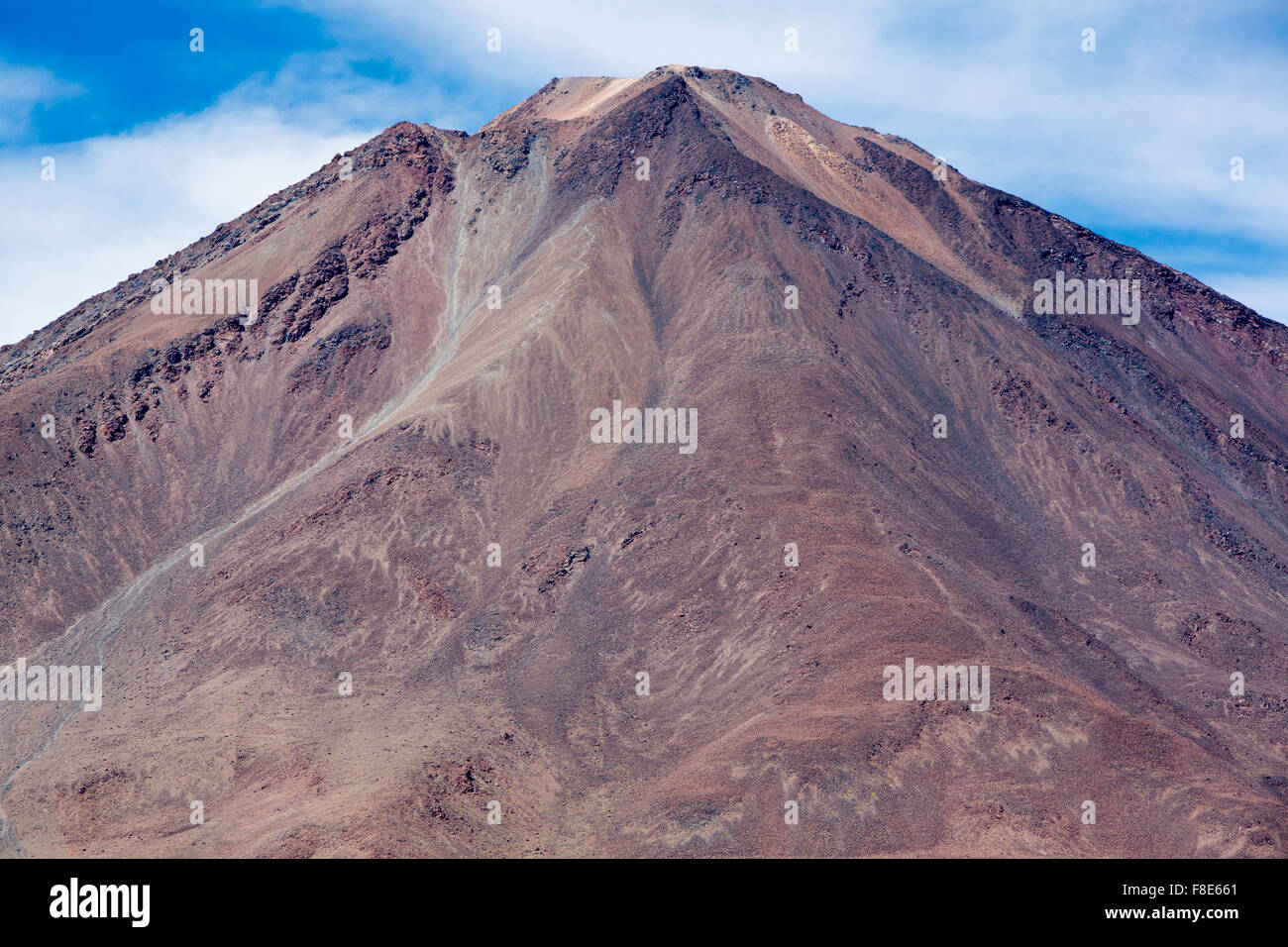 Volcano Licancabur andf cloudy blue sky Stock Photo - Alamy
