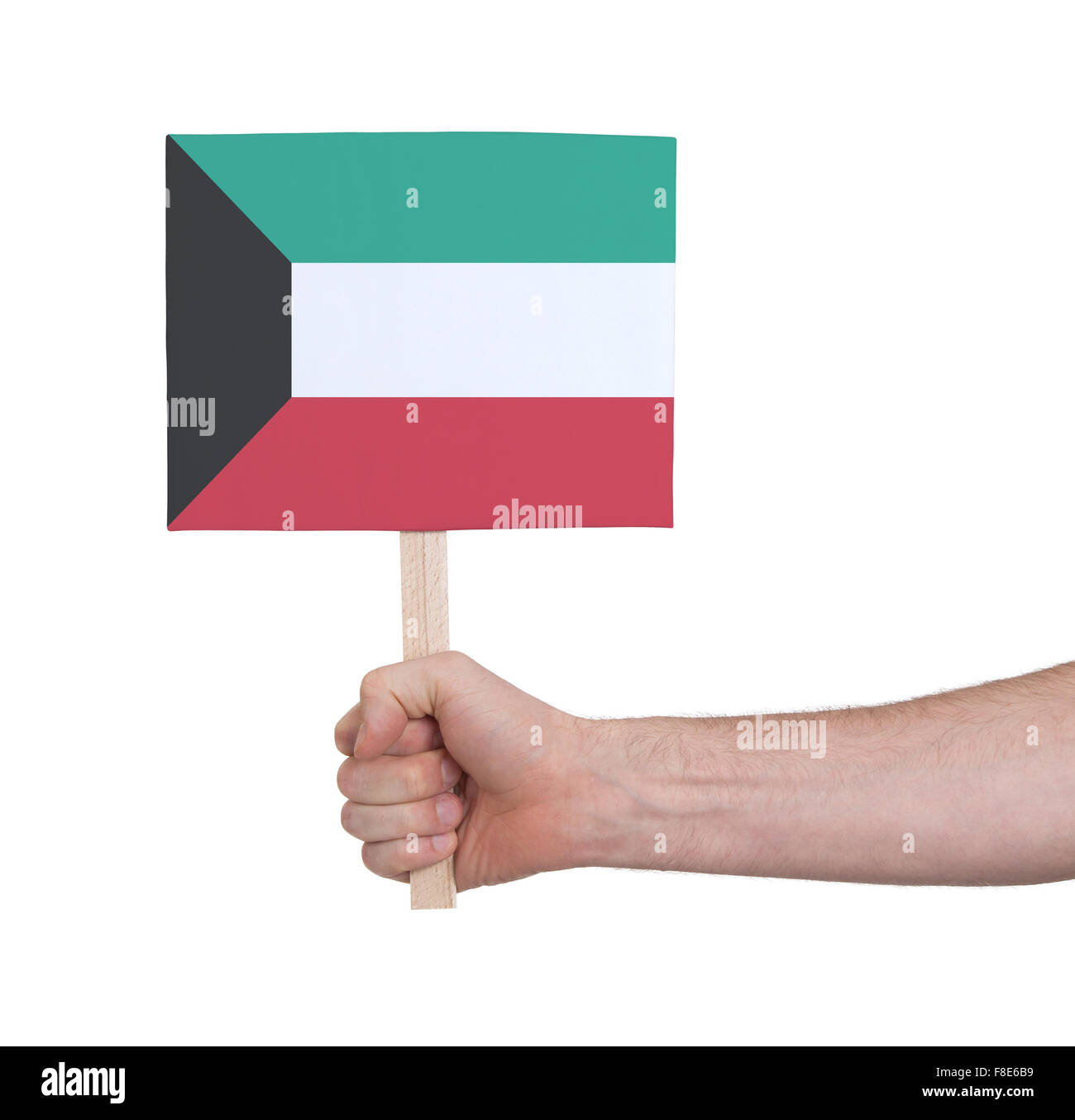 Hand holding small card, isolated on white - Flag of Kuwait Stock Photo ...