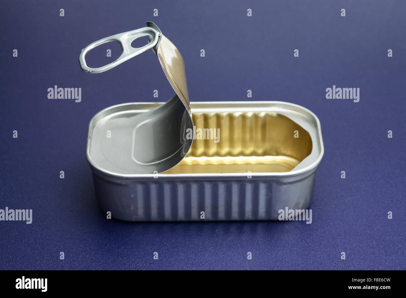 Opened and empty generic food packaging can Stock Photo - Alamy