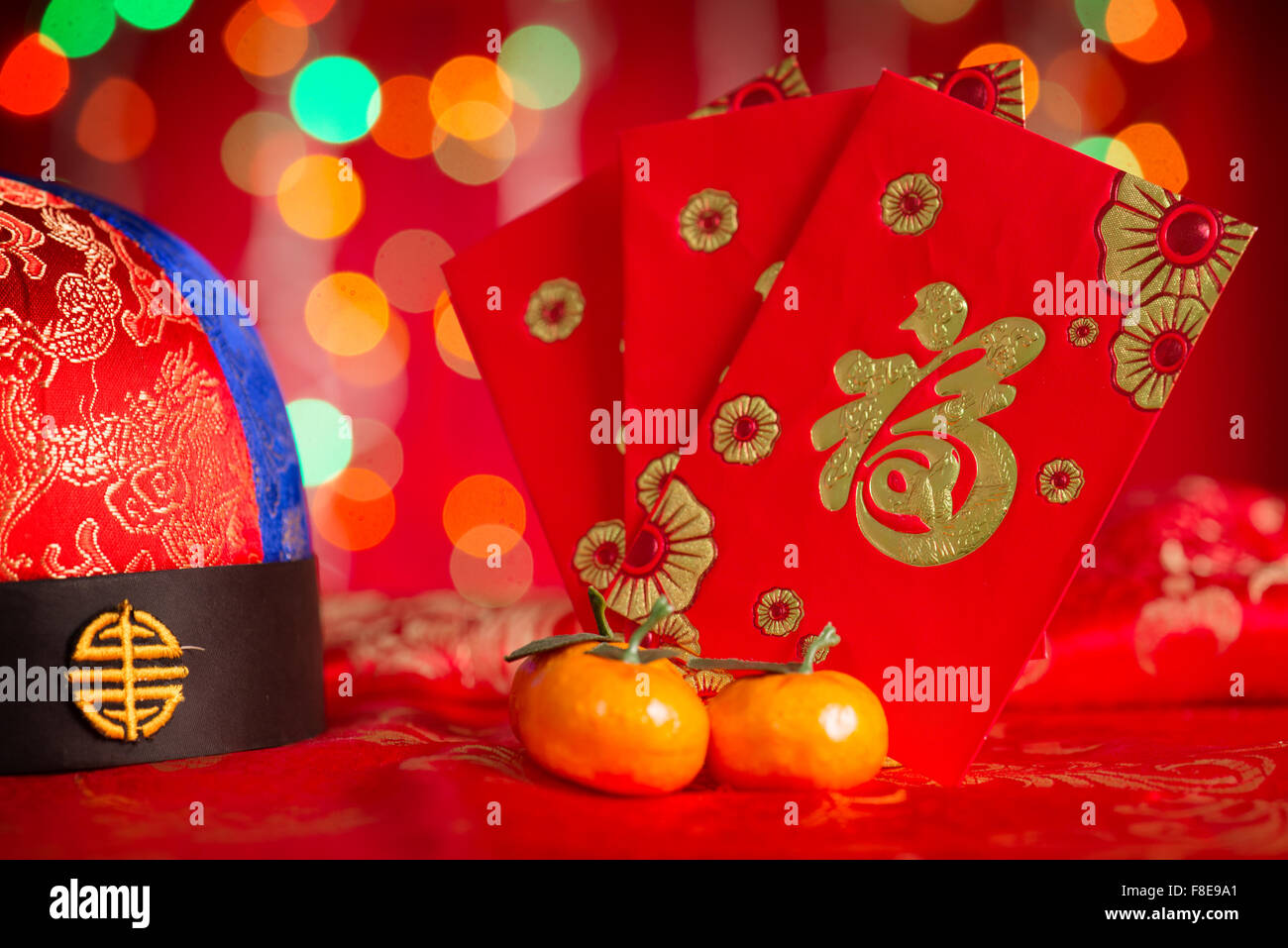 Chinese new year festival decorations, red packet and mandarin orange ...