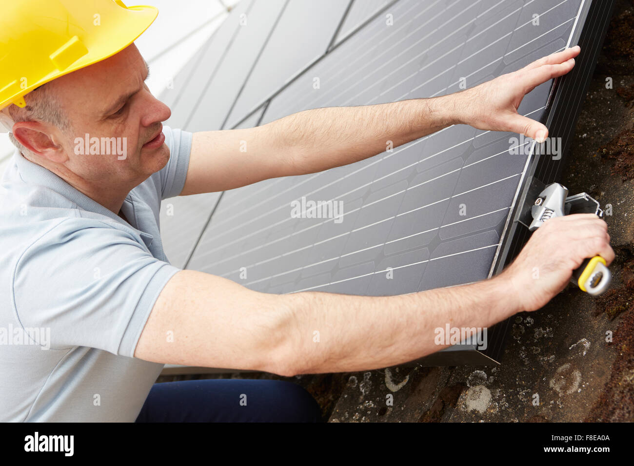 Installing solar panels on roof hi-res stock photography and images - Alamy