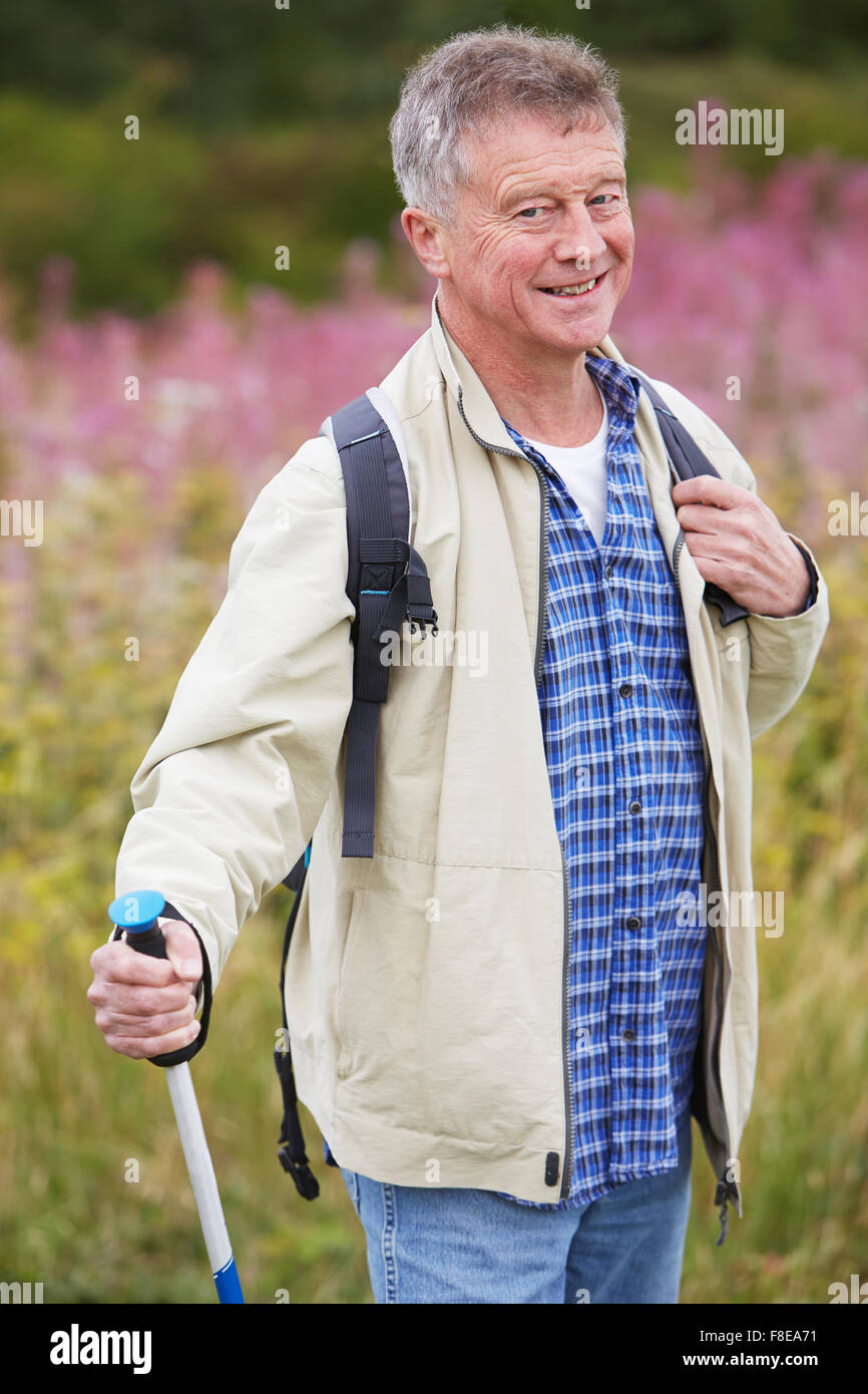 Senior Man Enjoying Hike In The Countryside Stock Photo - Alamy