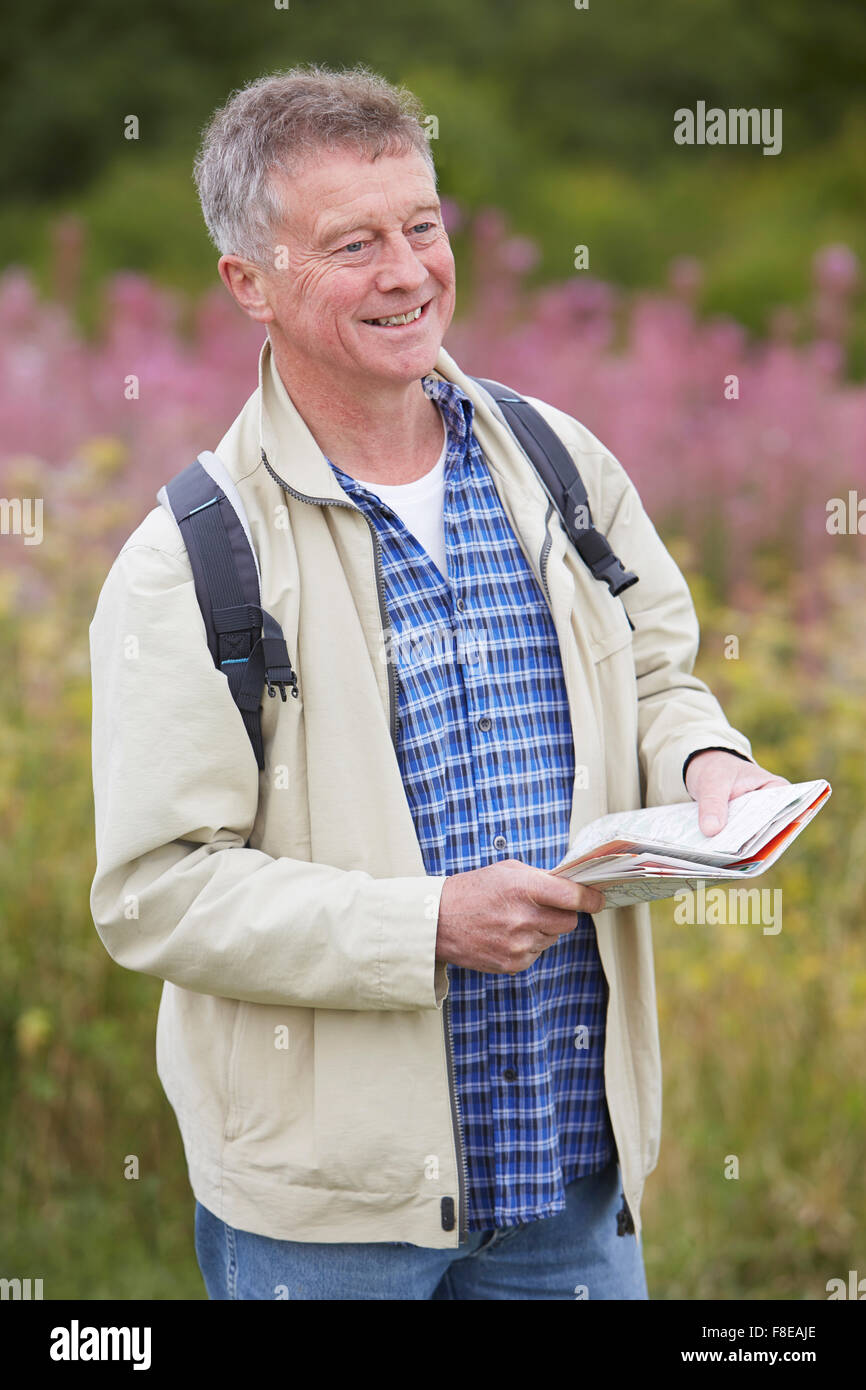Senior Man Enjoying Hike In The Countryside Stock Photo - Alamy