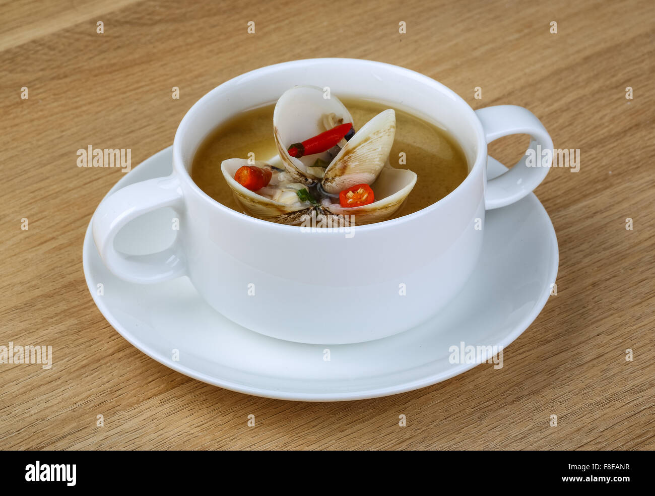 Asian traditional Shell soup on the wood background Stock Photo - Alamy