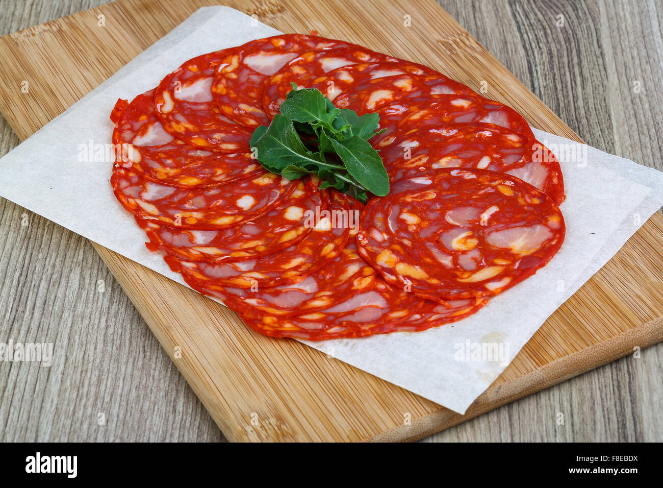 Traditional Spanish salami - Chorizo sausage on the wood background ...