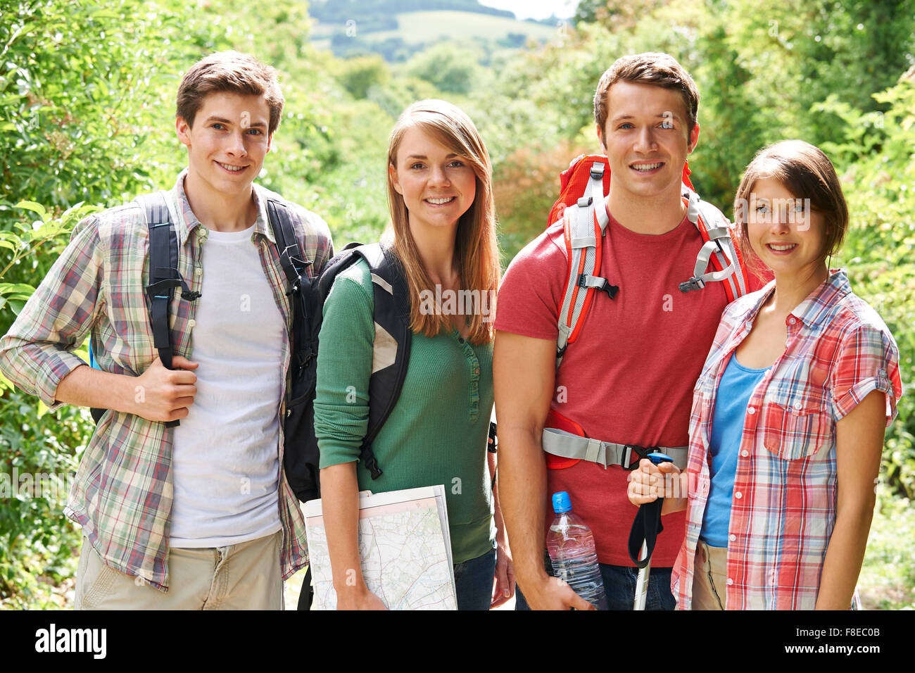 Group 20s Young Friends Hiking In Countryside Stock Photo - Alamy
