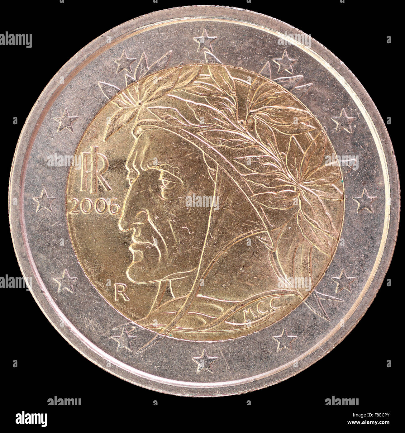 National side of two euro coin issued by Italy isolated on a black ...