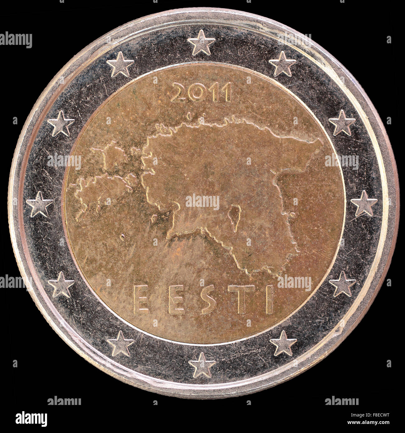 National side of two euro coin issued by Estonia isolated on a black ...