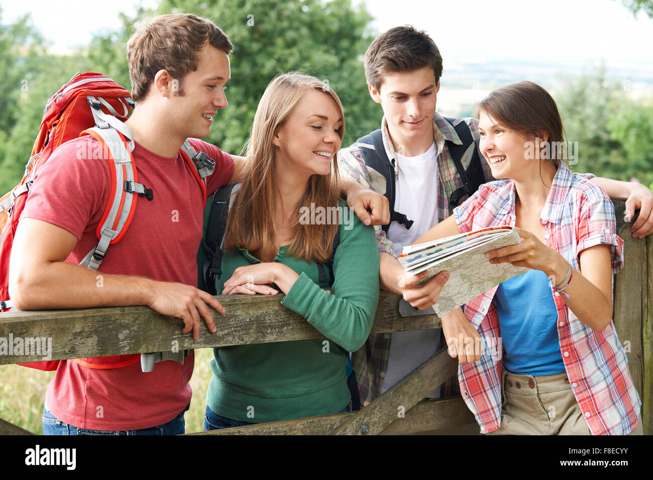 Group Of Young Friends Hiking In the Countryside Stock Photo - Alamy