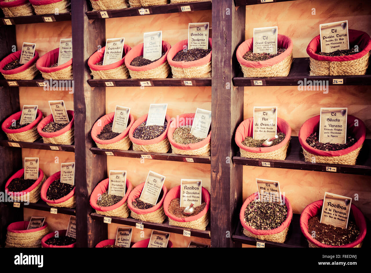 Spices, seeds and tea sold in a traditional market in Granada, Spain ...