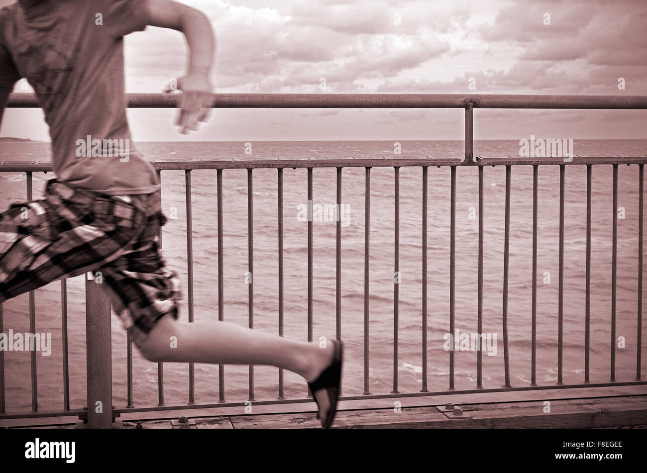 boy running by sea Stock Photo - Alamy