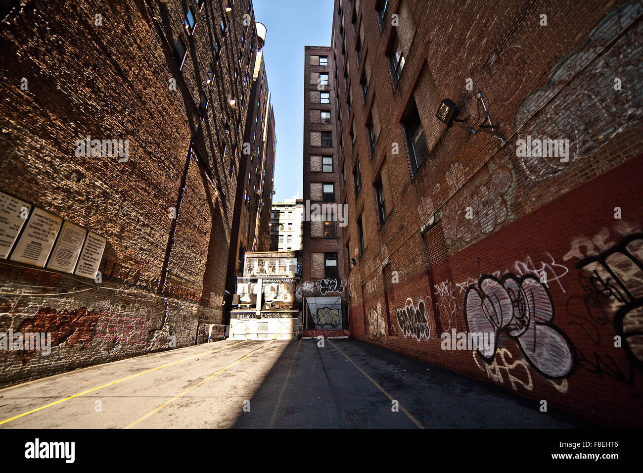 sun falling into backyard of a building in New York City , dead end ...