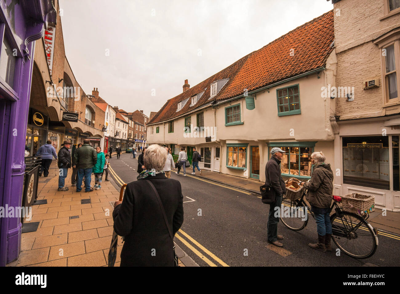 A view of Goodramgate, a street in the city of York showing pedestrians ...