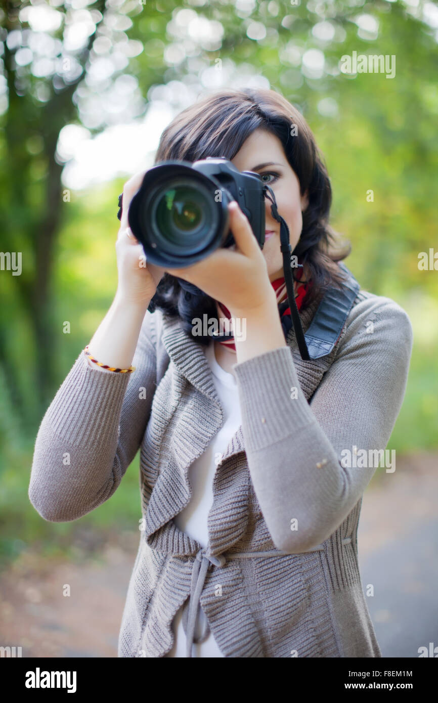 beautiful female photographer with camera outdoor Stock Photo - Alamy