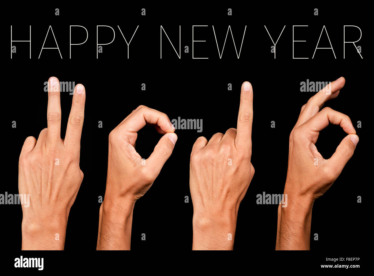 man hands forming the number 2016, as the new year, and the text happy ...
