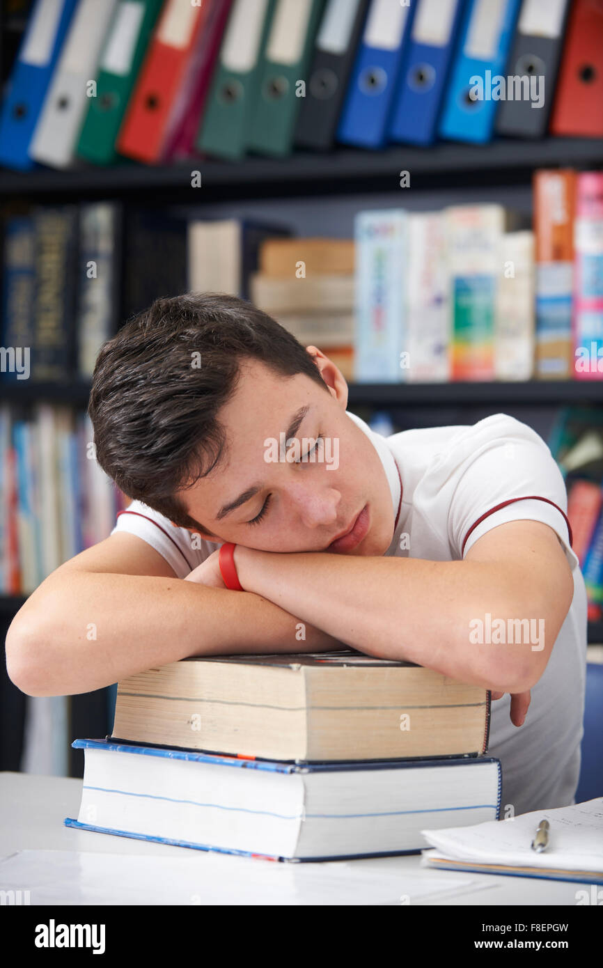 Student sleeping in library hi-res stock photography and images - Alamy