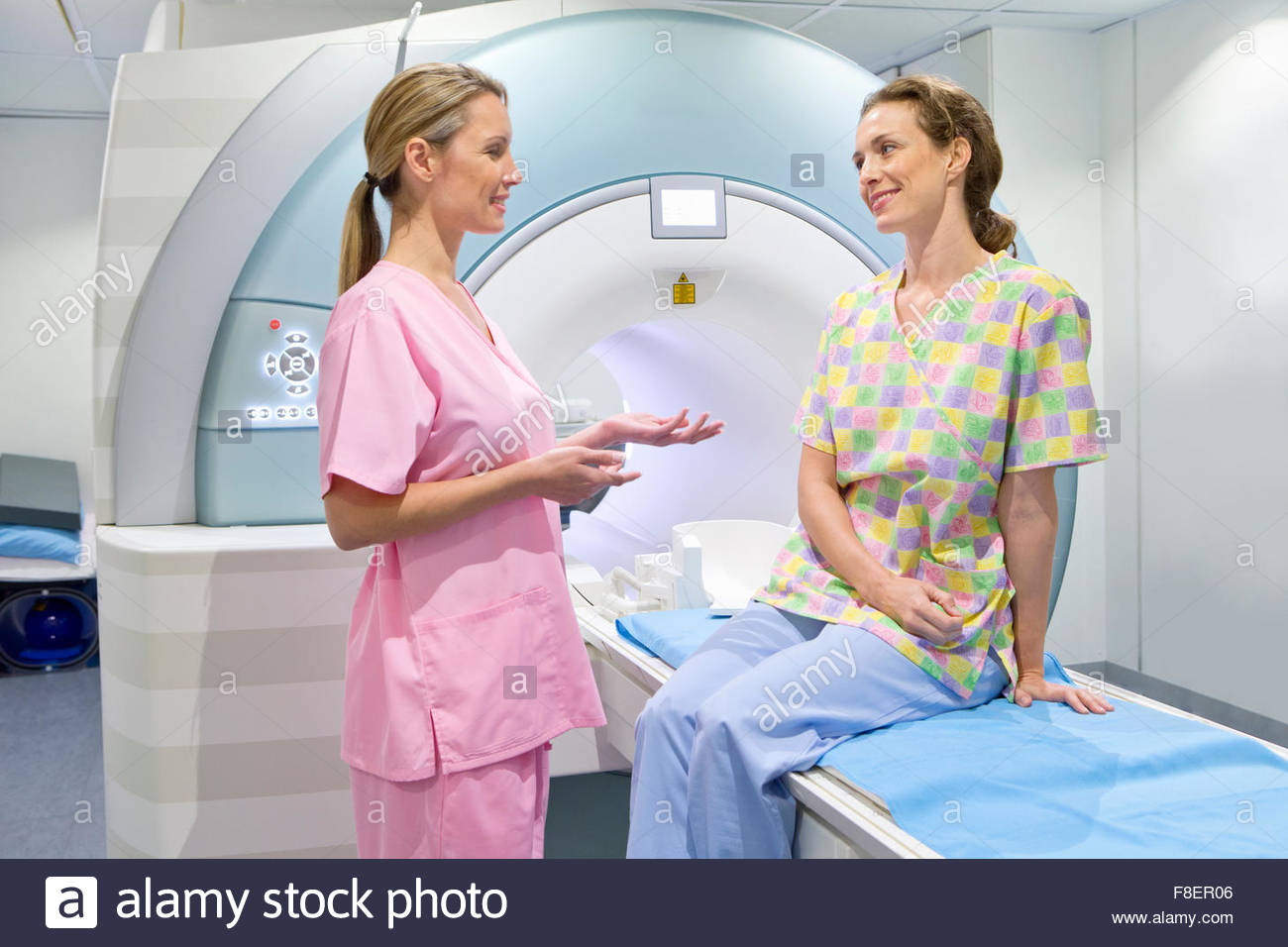 Female Nurse In Scrubs Face Stock Photos & Female Nurse In Scrubs Face ...