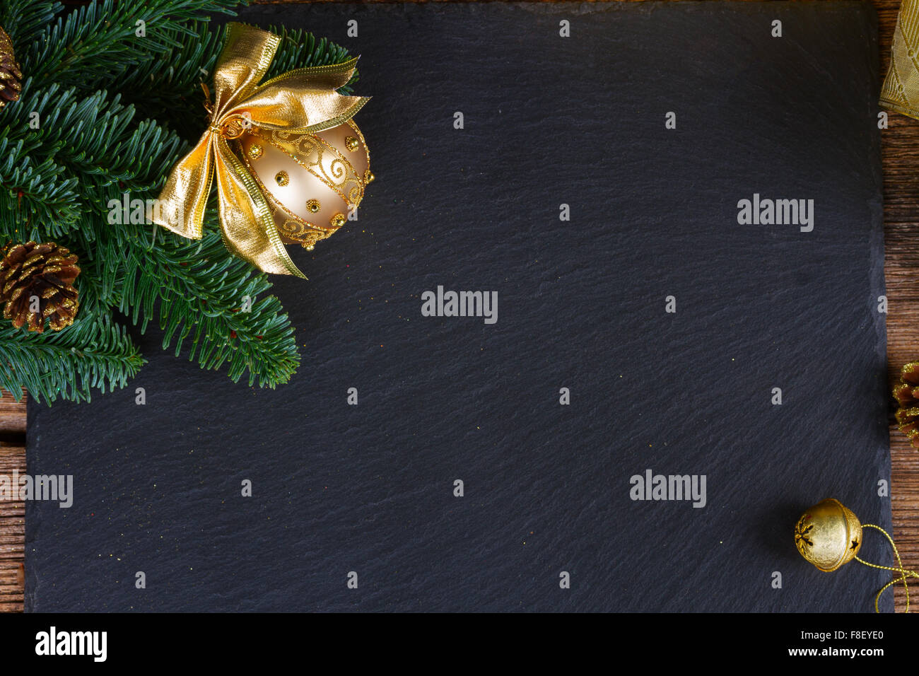evergreen tree with golden ball Stock Photo - Alamy