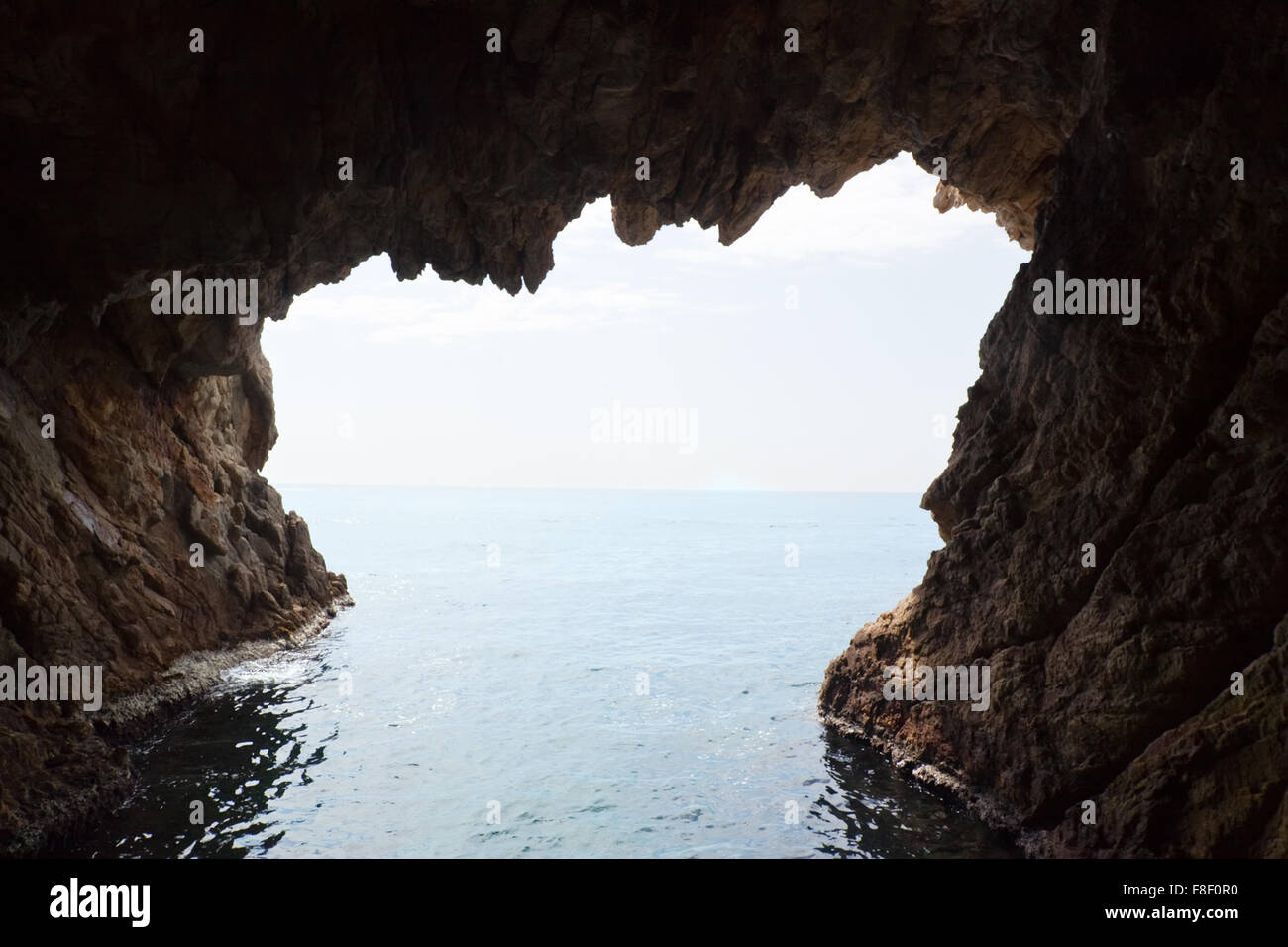 Inside view of grotto in coast. Nature composition Stock Photo - Alamy