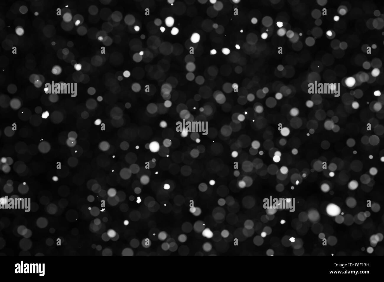 Snow Falling from Night Sky Stock Photo - Alamy