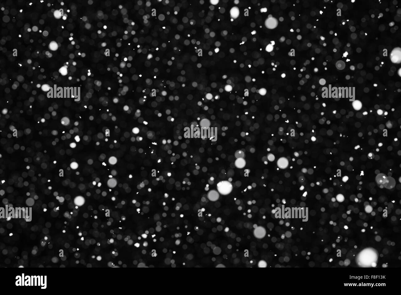 Snow Falling from Night Sky Stock Photo - Alamy