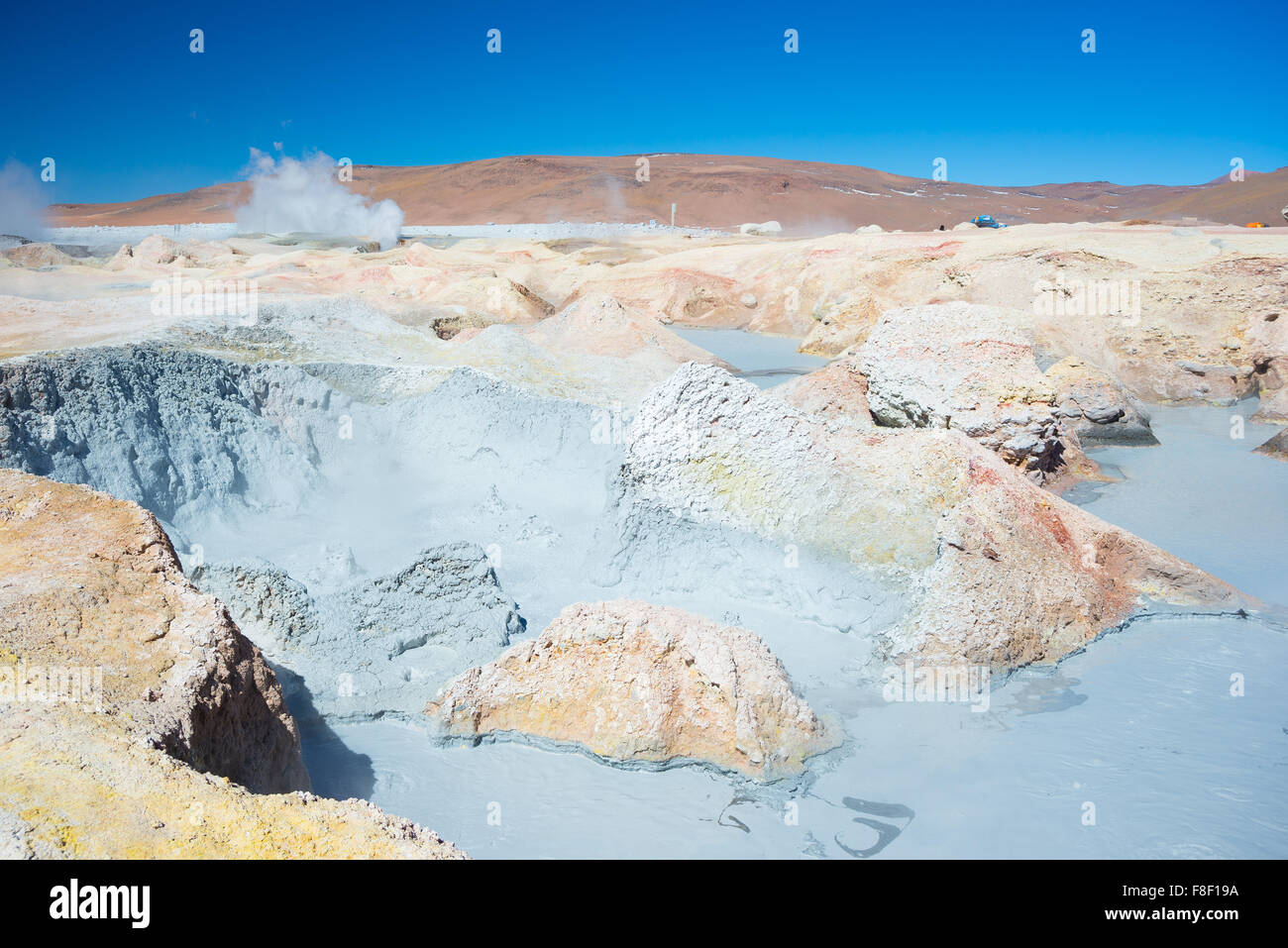 Steaming hot water ponds and mud pots in geothermal region of the ...