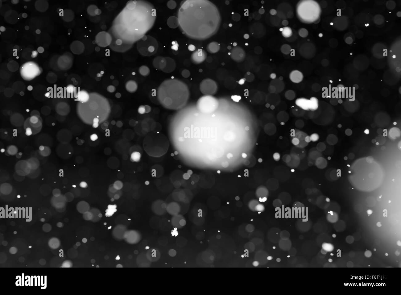 Snow Falling from Night Sky Stock Photo - Alamy