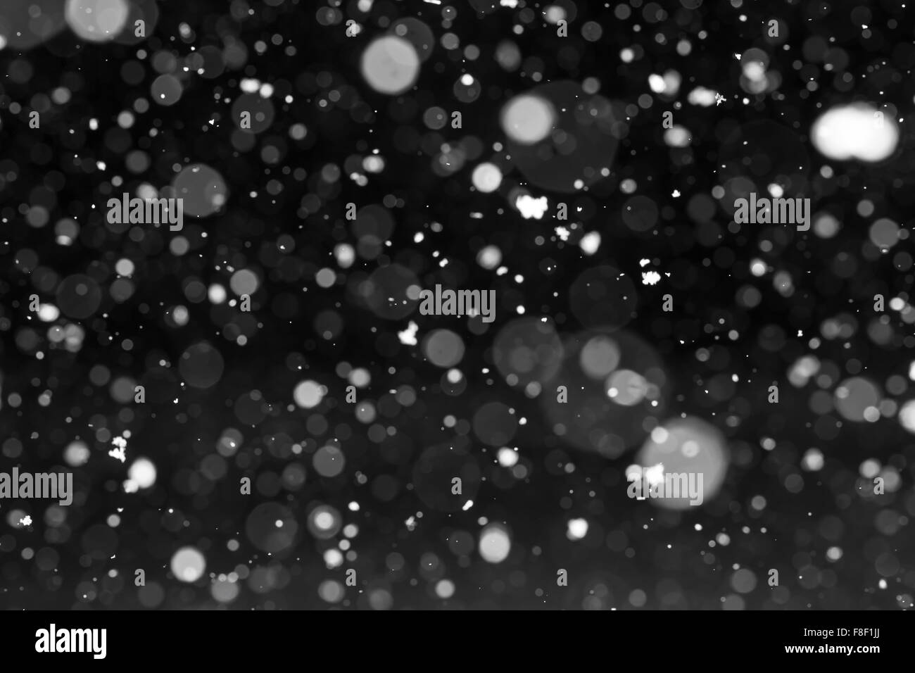 Snow Falling from Night Sky Stock Photo - Alamy