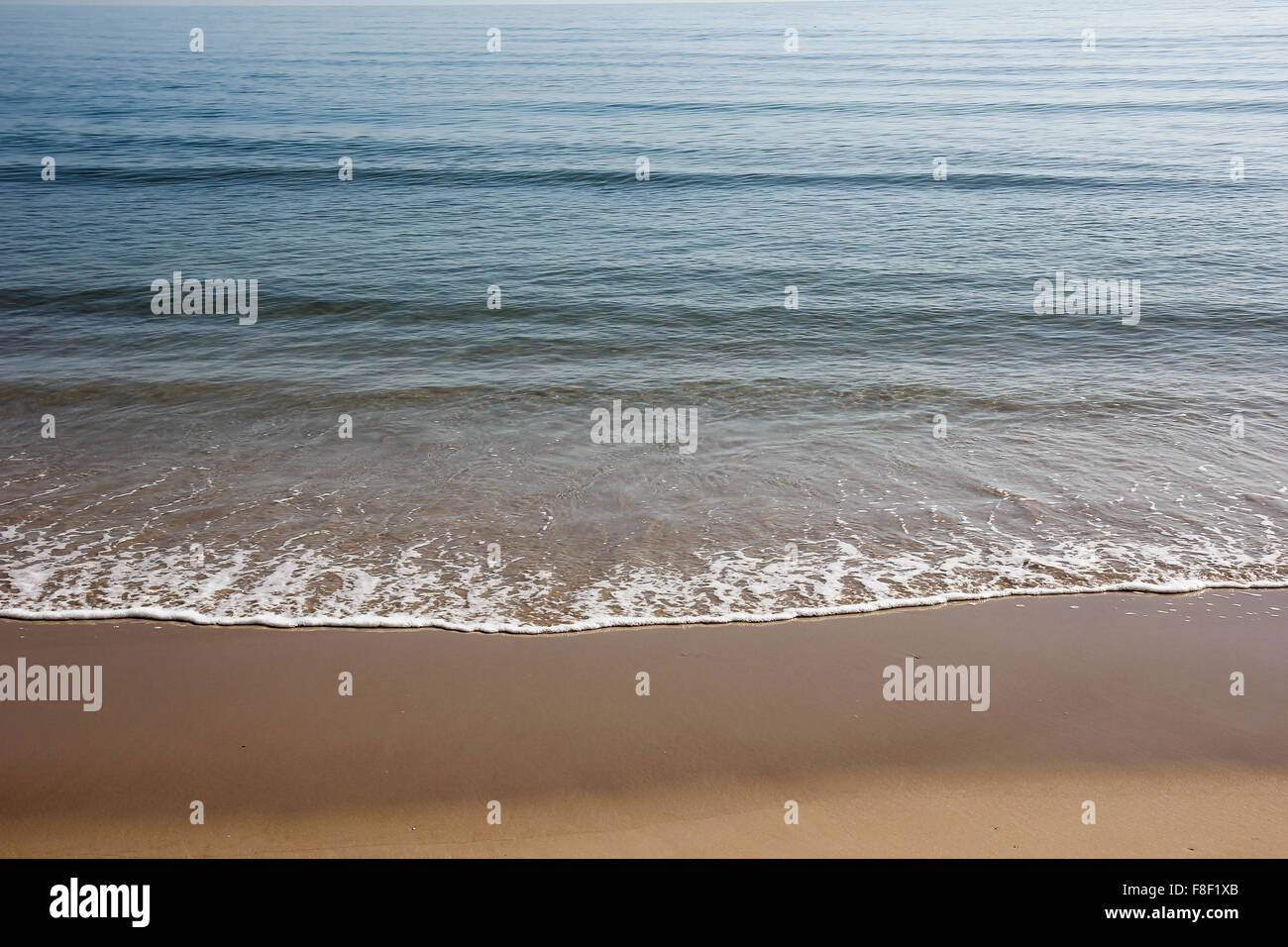 Wave sea on sand beach hi-res stock photography and images - Alamy