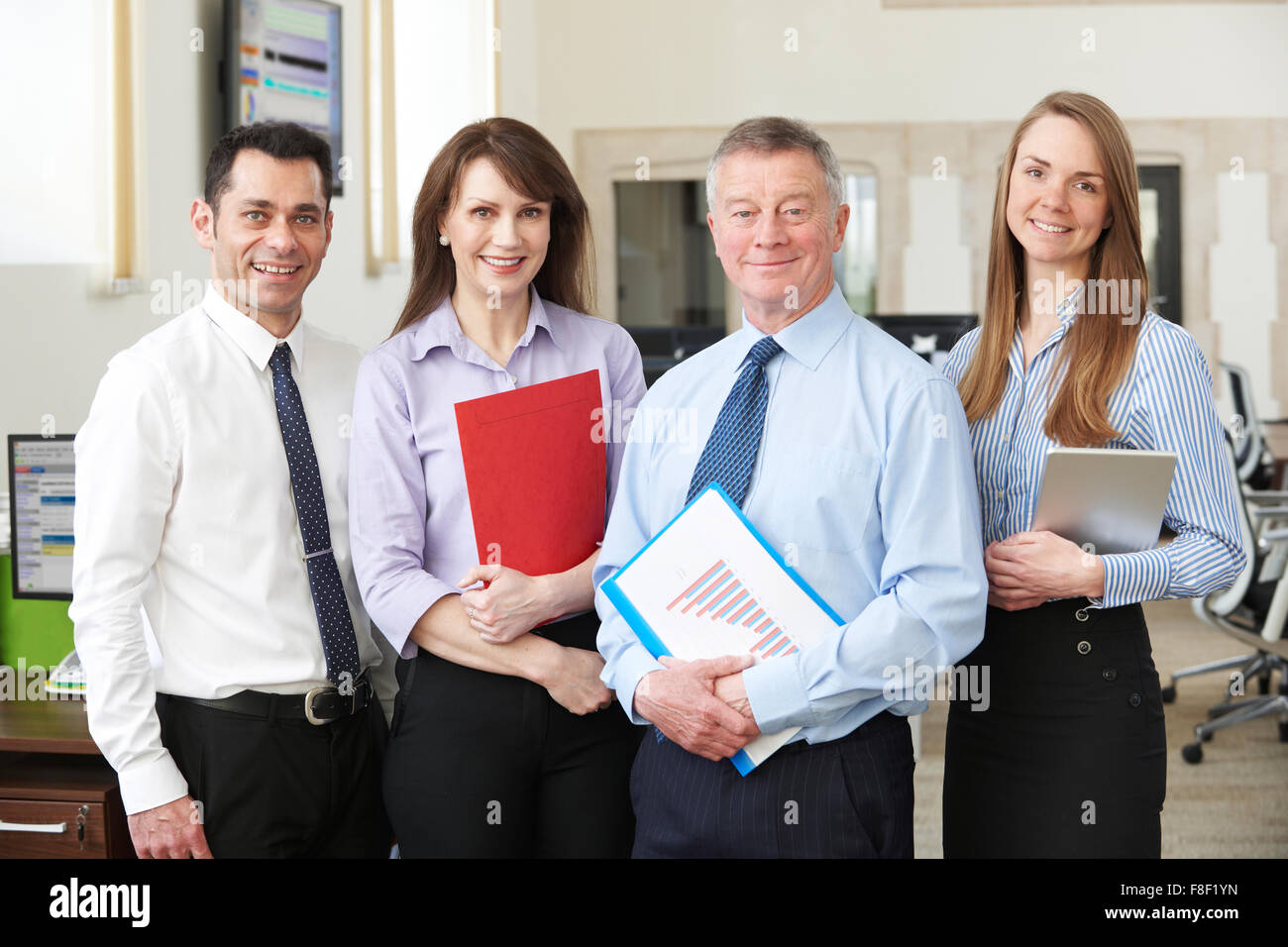 Business team standing in modern hi-res stock photography and images ...