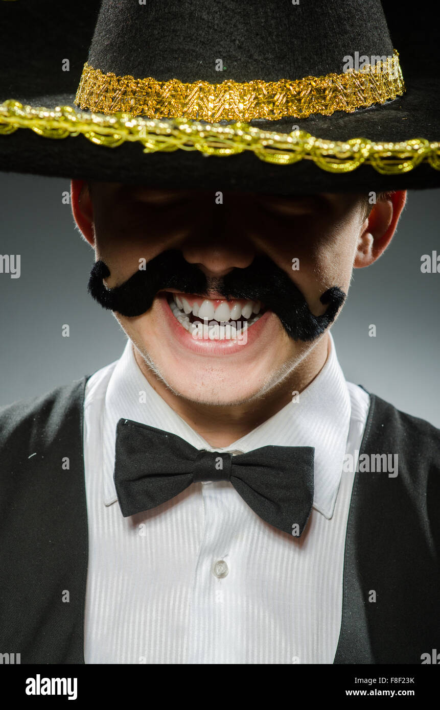 Smiling mexican with sombrero isolated on white Stock Photo - Alamy