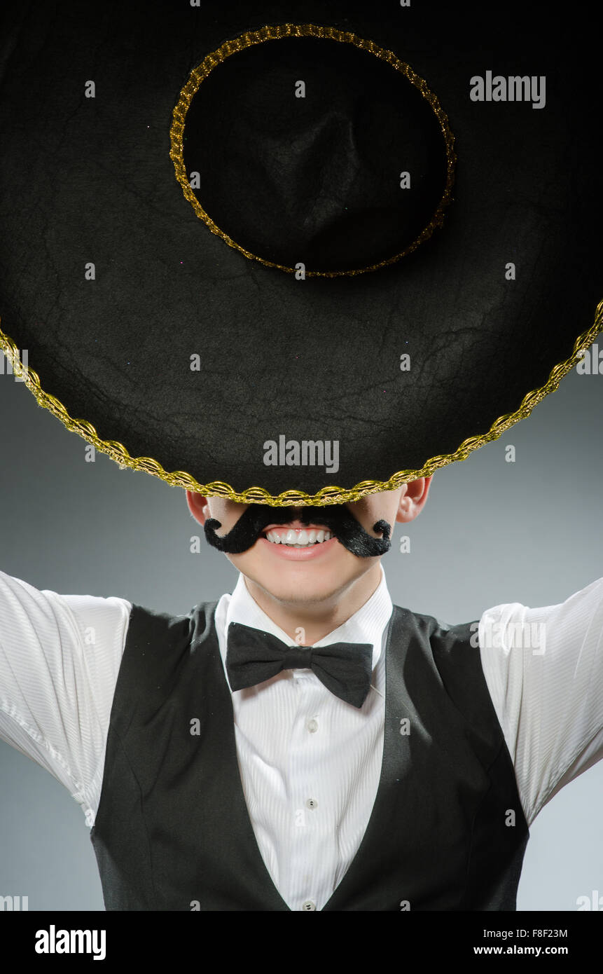 Smiling mexican with sombrero isolated on white Stock Photo - Alamy