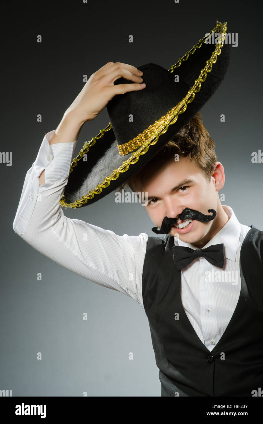 Smiling mexican with sombrero isolated on white Stock Photo - Alamy
